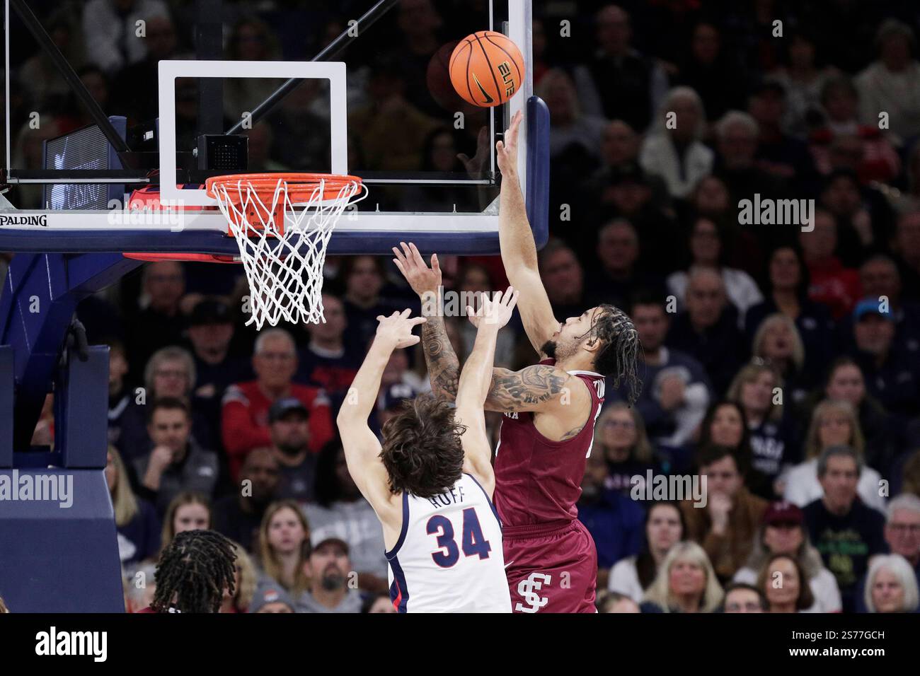 Santa Clara forward Camaron Tongue, right, shoots while pressured by ...
