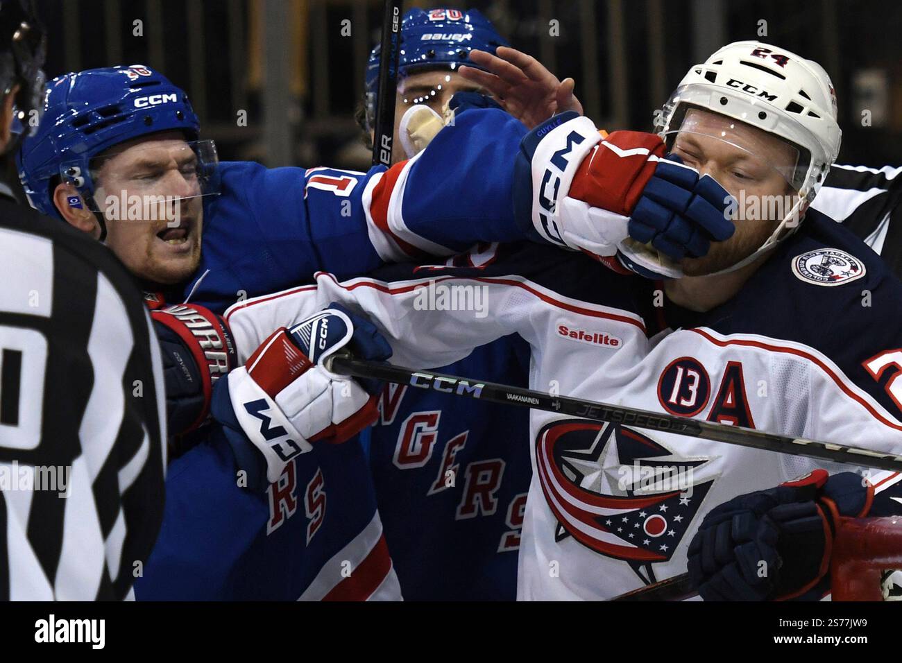 New York Rangers' Urho Vaakanainen, left, and Columbus Blue Jackets ...