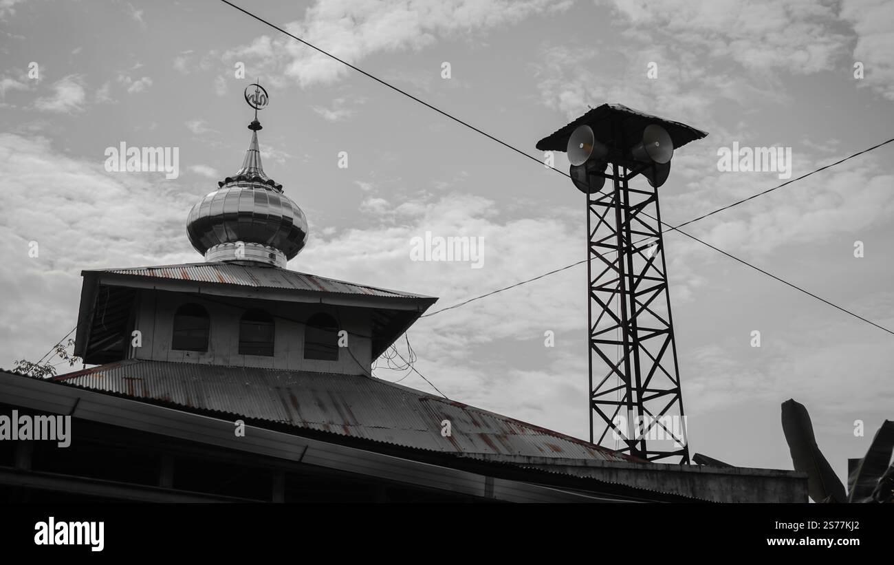 A black and white image featuring a traditional dome-shaped building ...