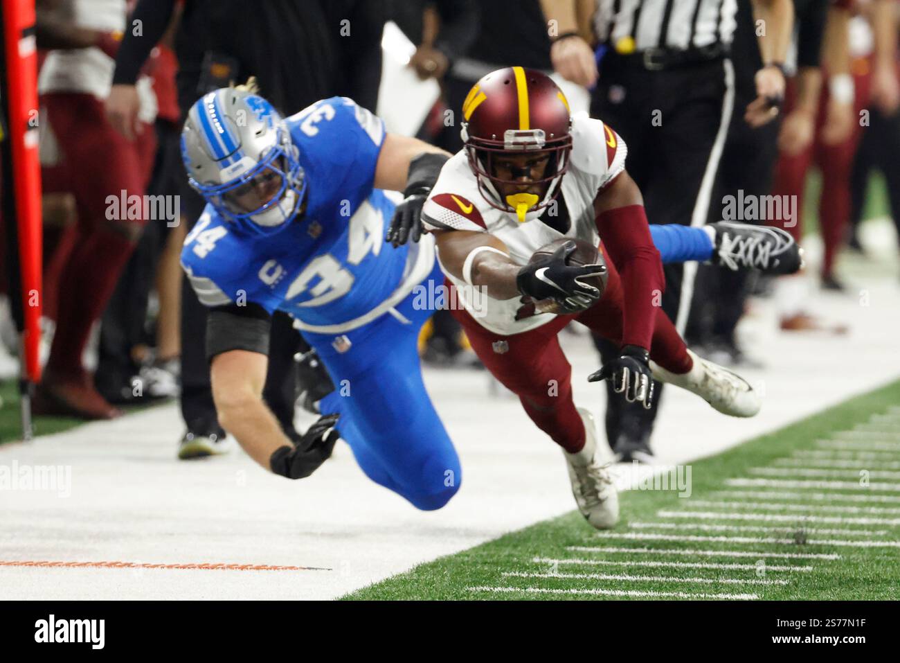 Washington Commanders wide receiver Jamison Crowder (80) is tackled by ...