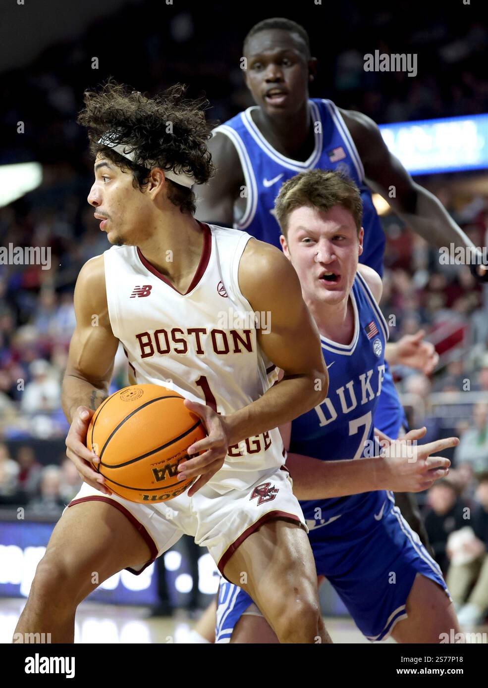 Boston College guard Dion Brown (1) defends the ball under the net from ...