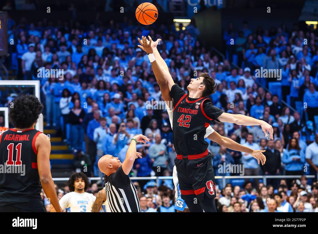 January 18, 2025: Stanford senior Maxime Raynaud (42) wins tipoff to ...
