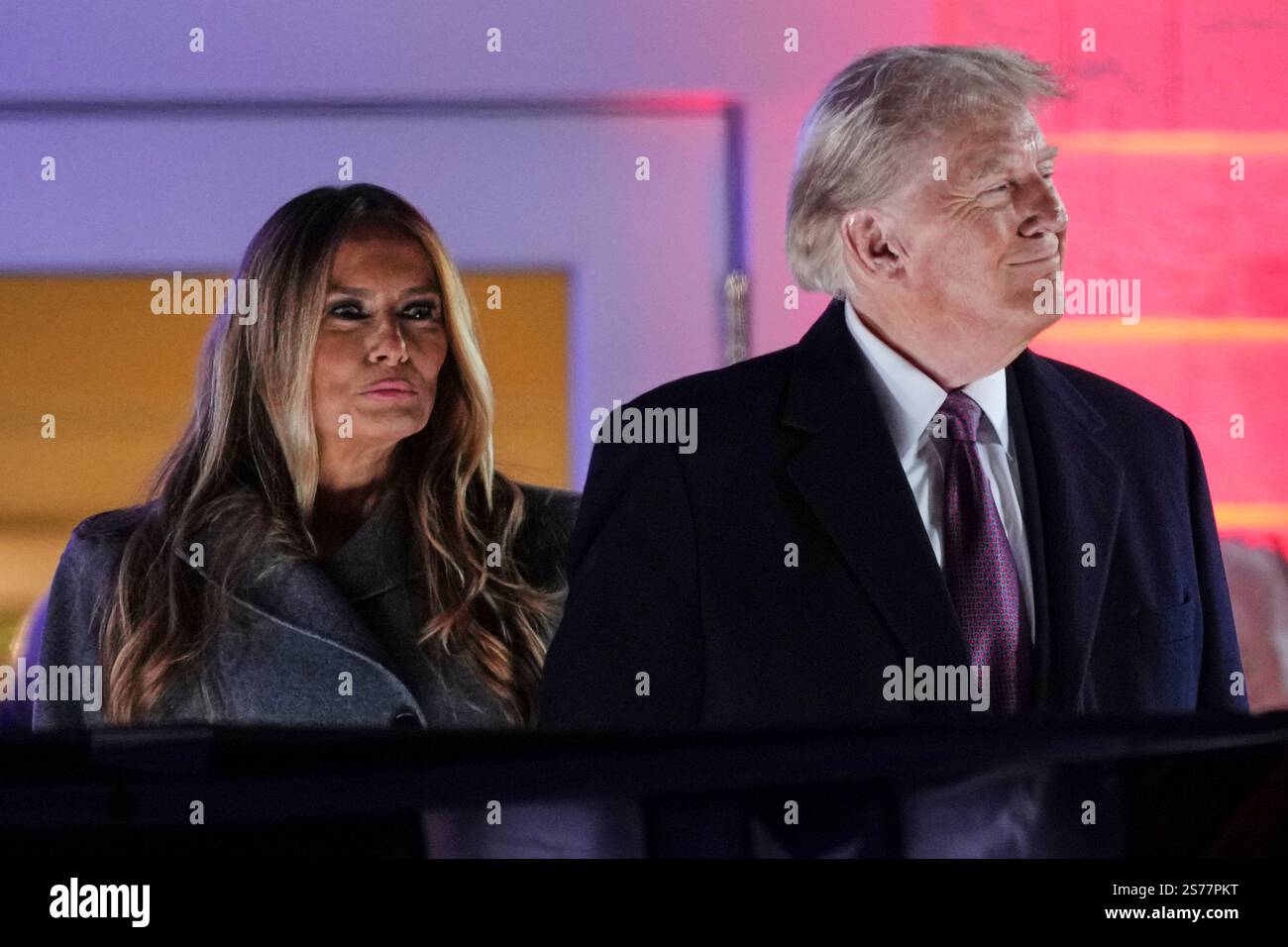 President-elect Donald Trump, right, and Melania Trump smile after a ...