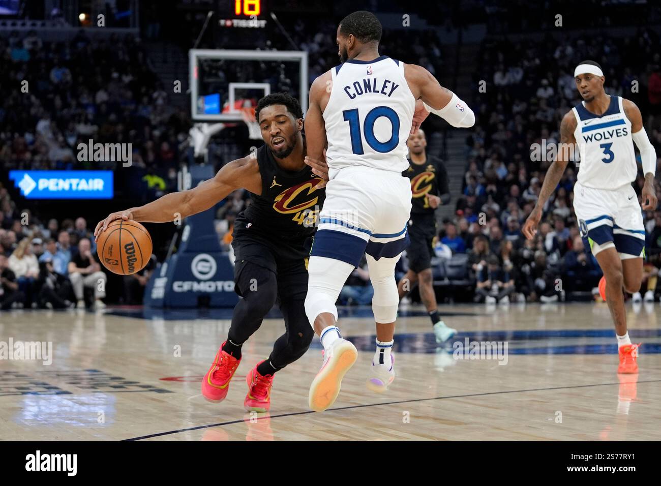 Cleveland Cavaliers guard Donovan Mitchell (45) works toward the basket ...