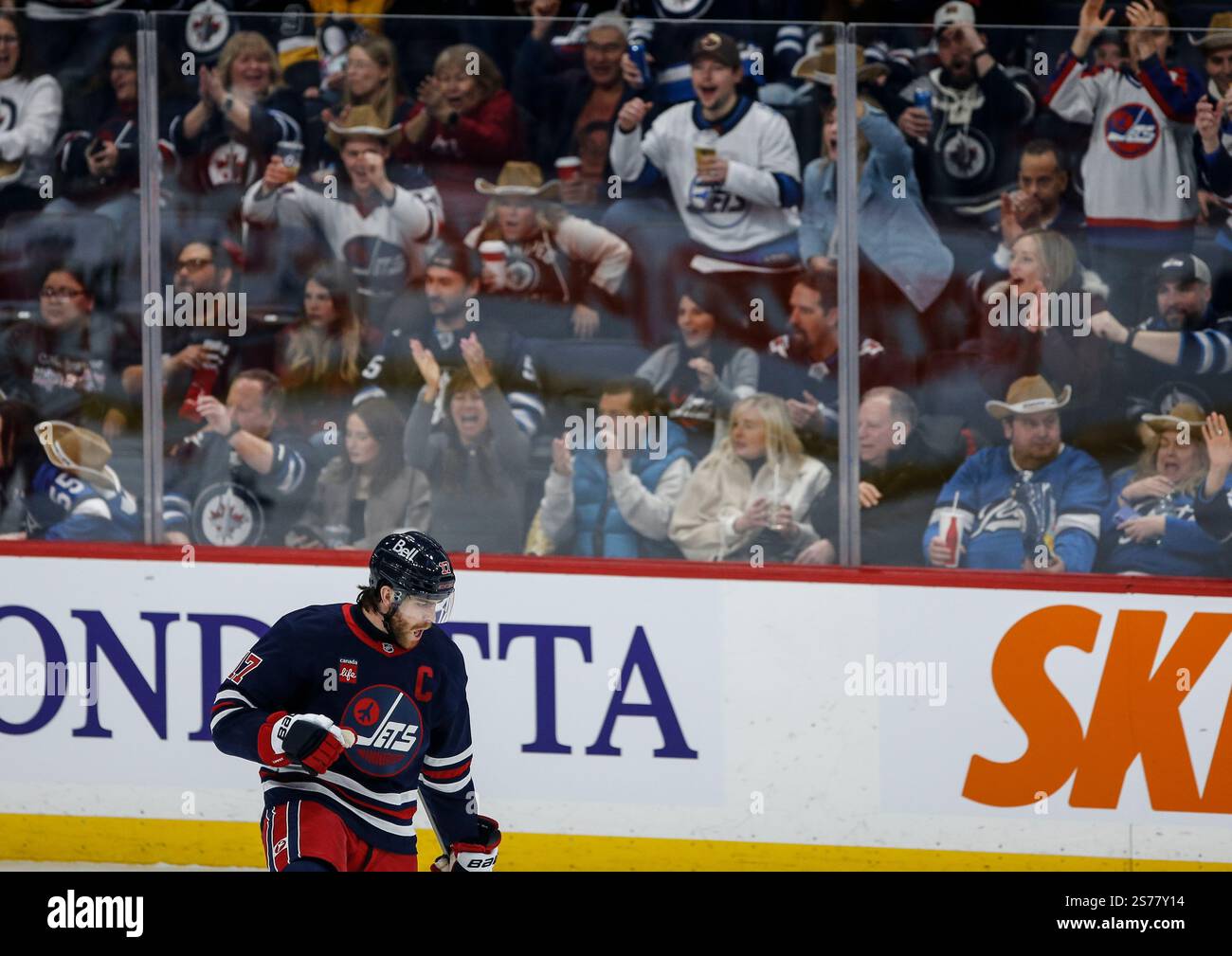 Winnipeg Jets' Adam Lowry (17) celebrates after his goal against the ...