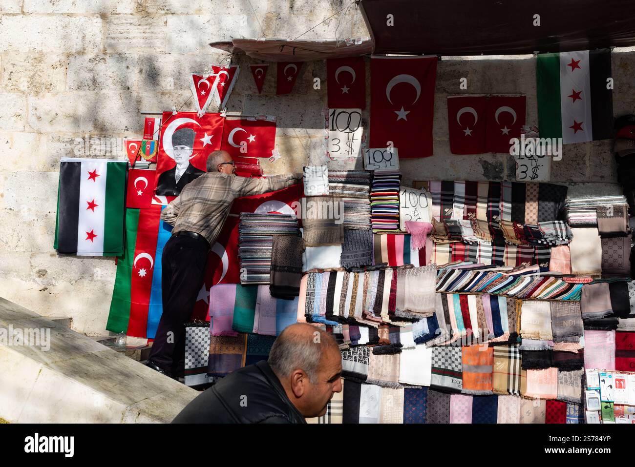 Istanbul, Turkey. 09th Jan, 2025. A man selling Turkish and Syrian ...