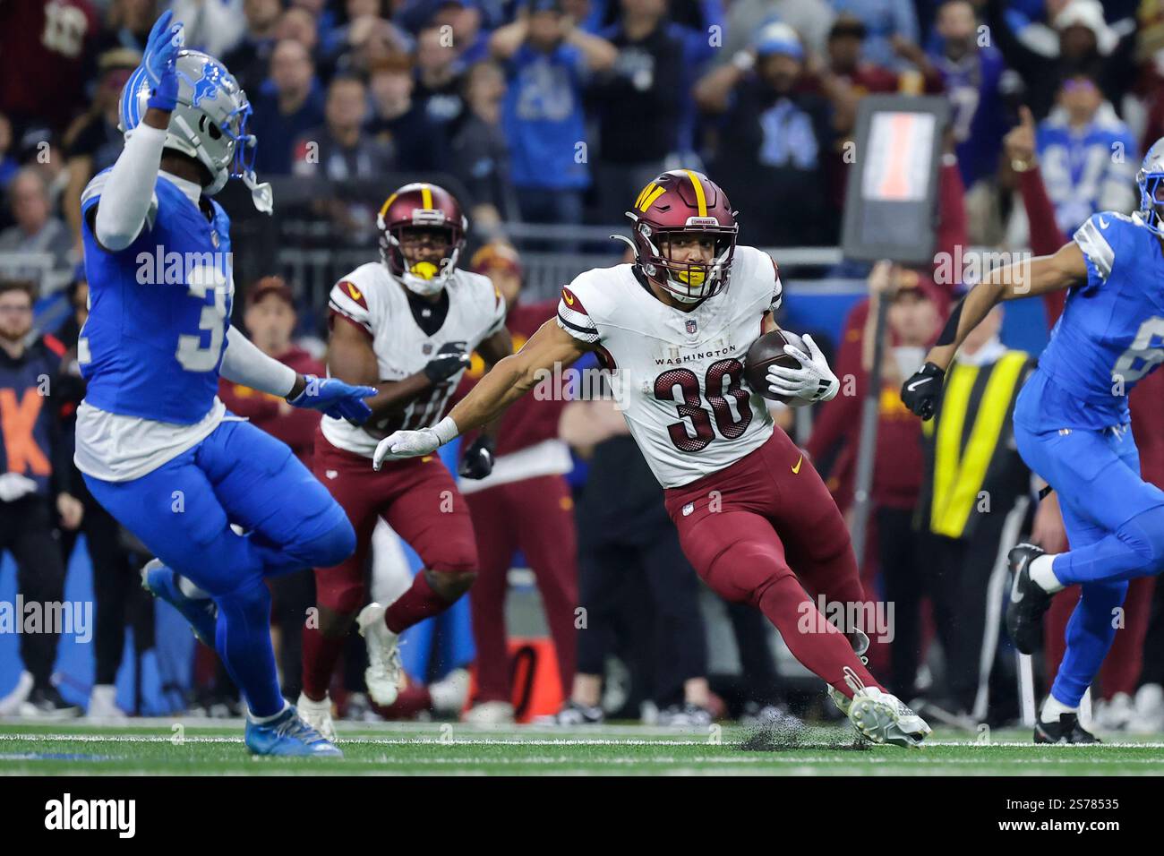 Washington Commanders running back Austin Ekeler (30) runs the ball ...