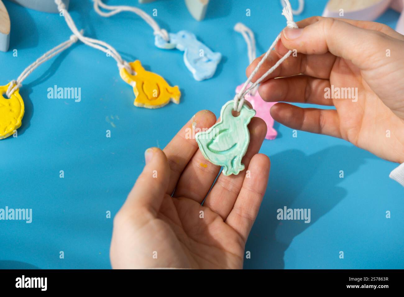 Creator is using white air dry clay for making decor to EASTER holiday ...