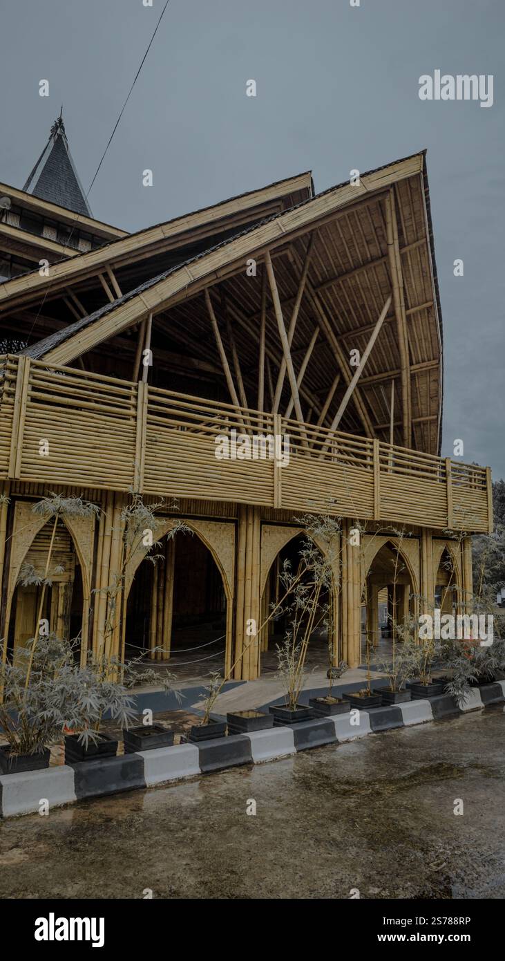 A unique bamboo mosque structure with intricate architectural design ...