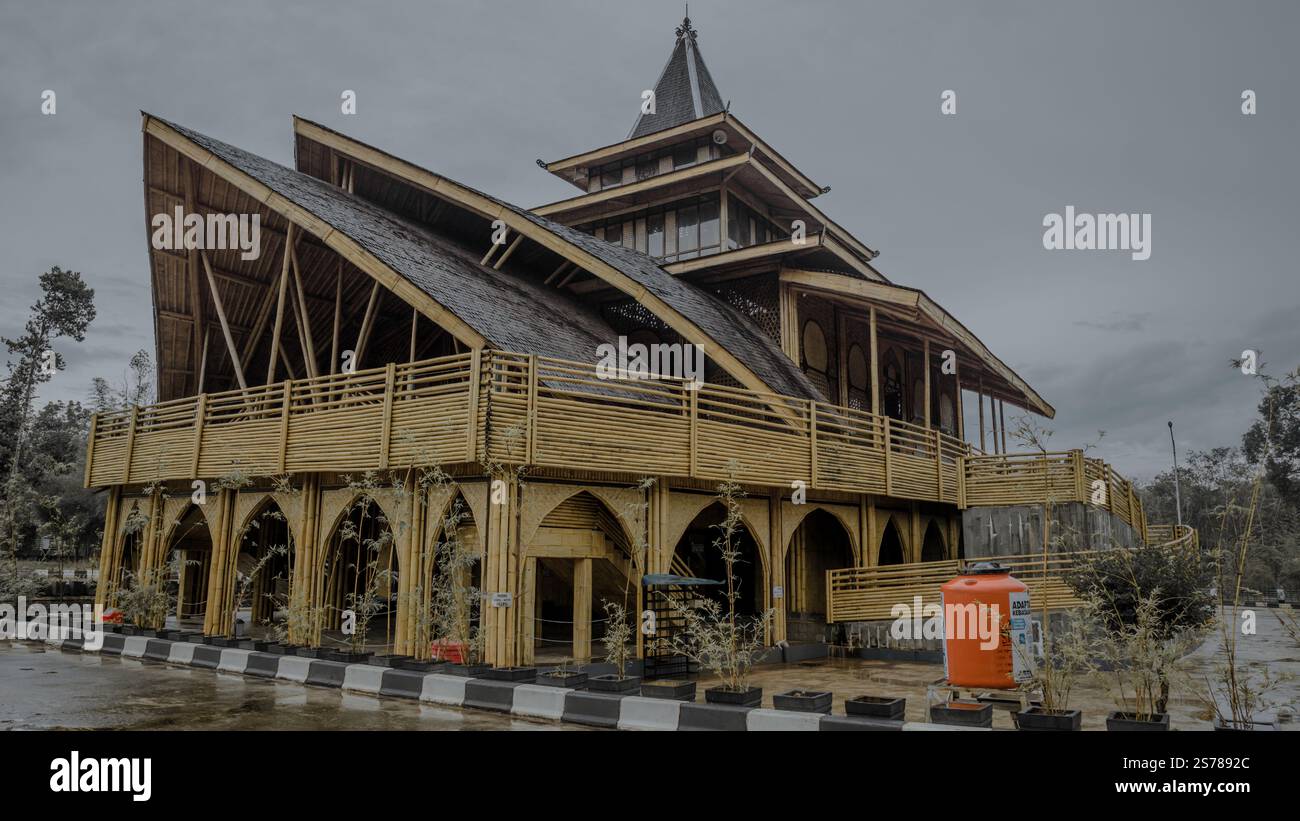 A unique wooden mosque building with intricate architectural design ...