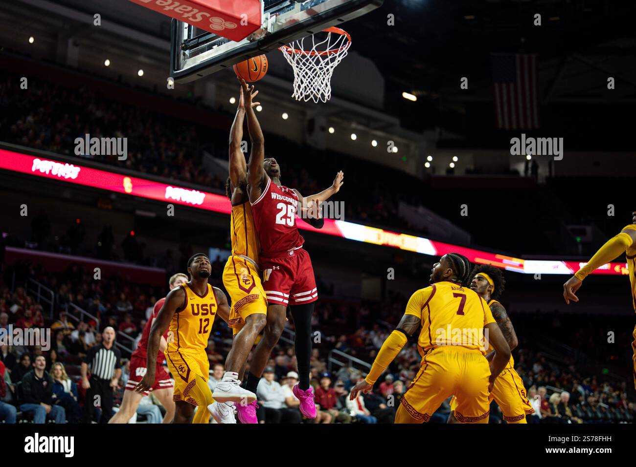 Wisconsin Badgers guard John Blackwell (25) scores and is fouled by USC ...