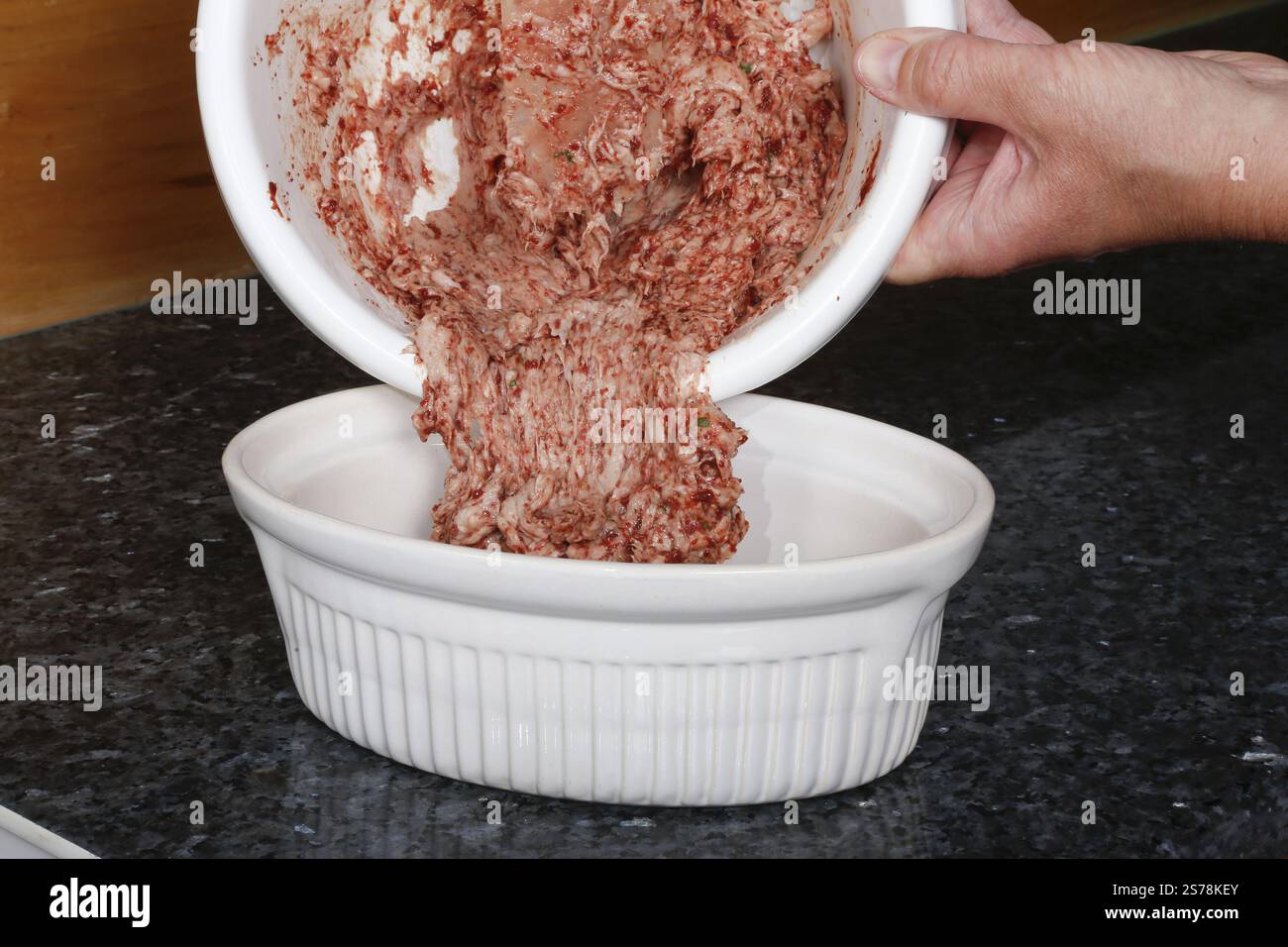 Male hands preparing meat loaf hi-res stock photography and images - Alamy