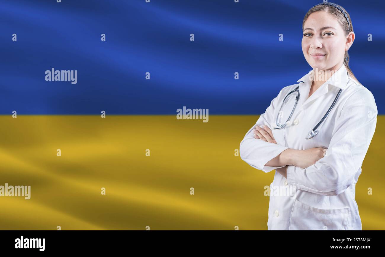 Female doctor on Ukraine flag. Doctor with crossed arms on Ukraine flag ...
