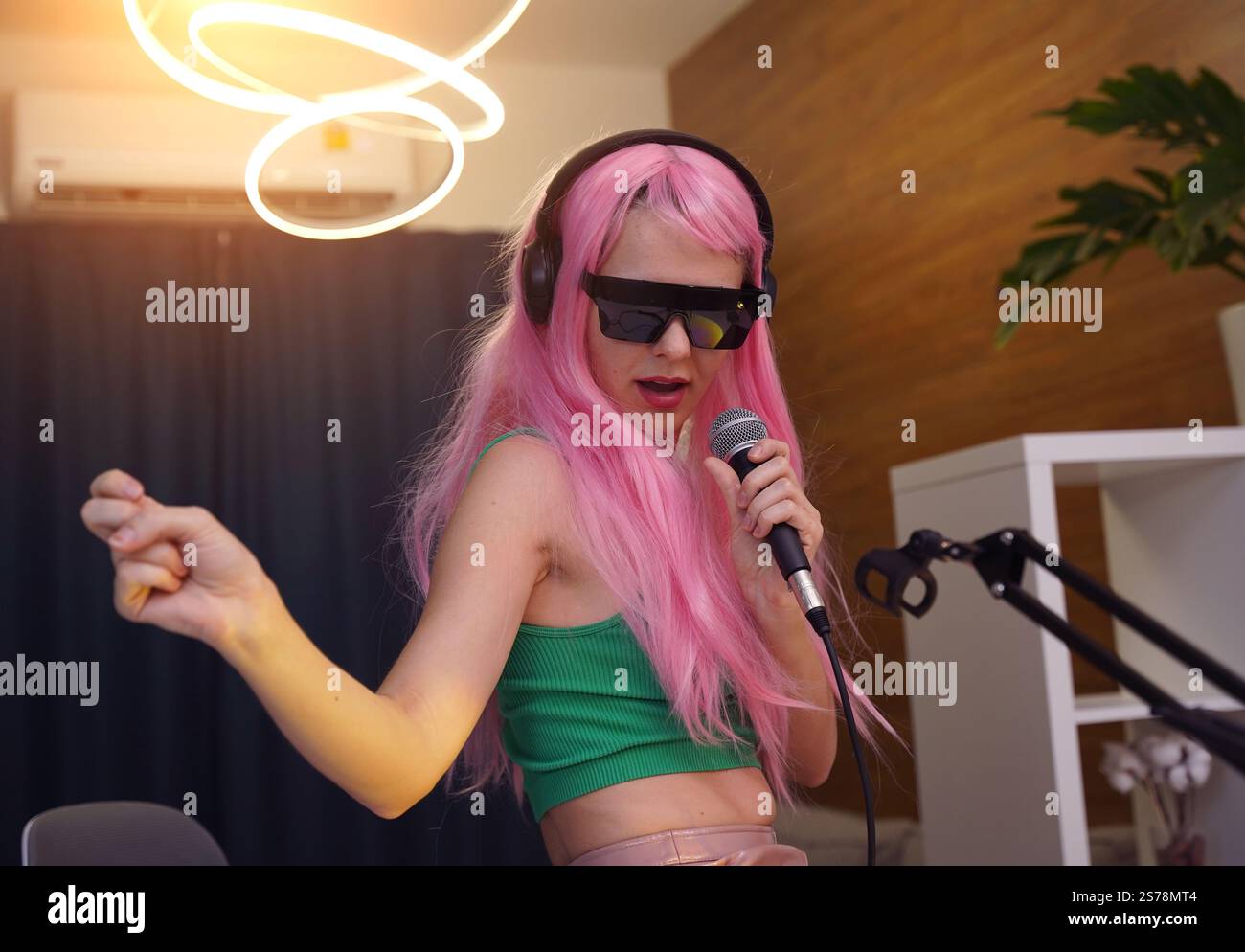 Beautiful young singer and musician broadcast from her home studio ...