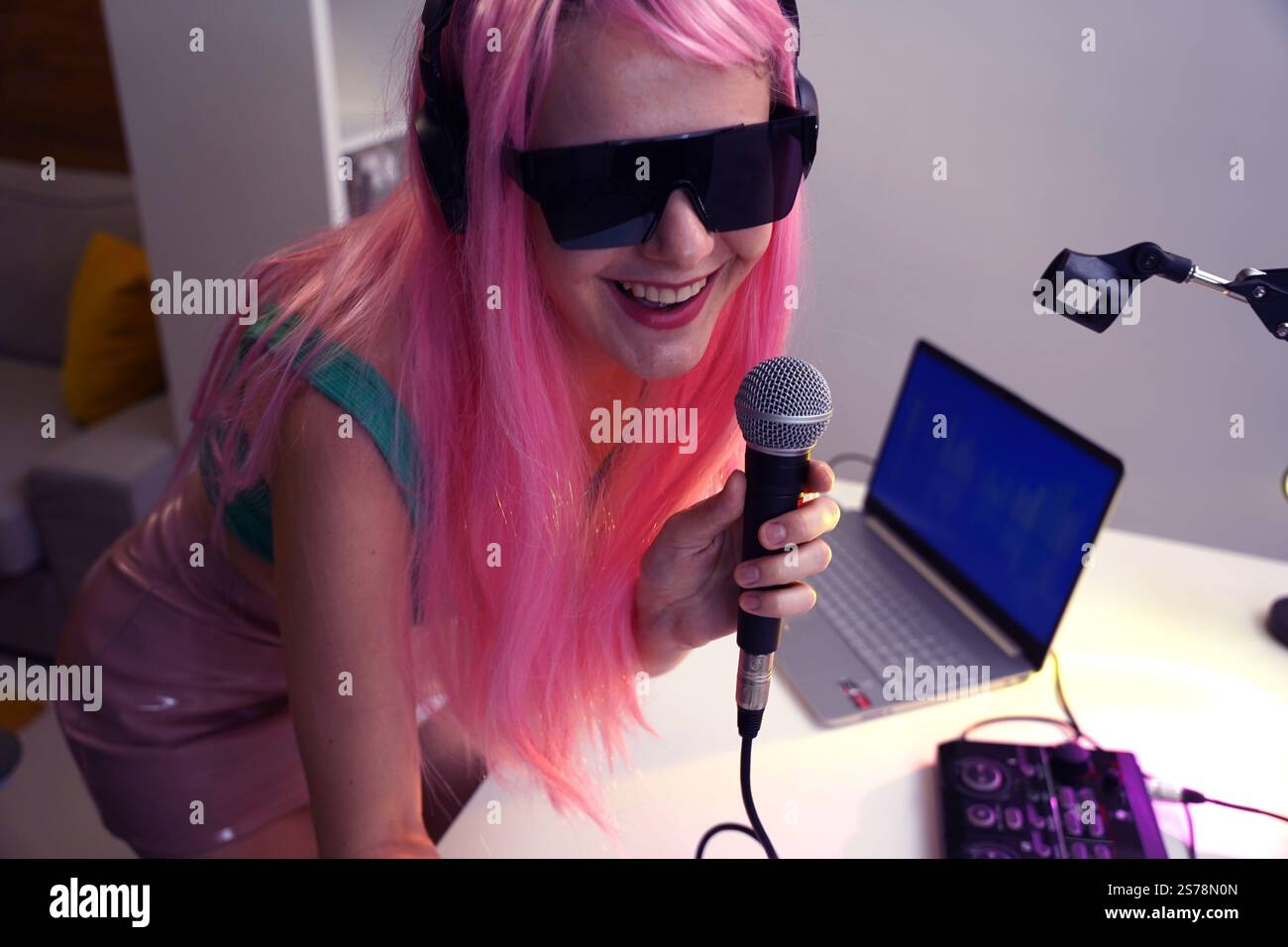 Beautiful young singer and musician broadcast from her home studio ...