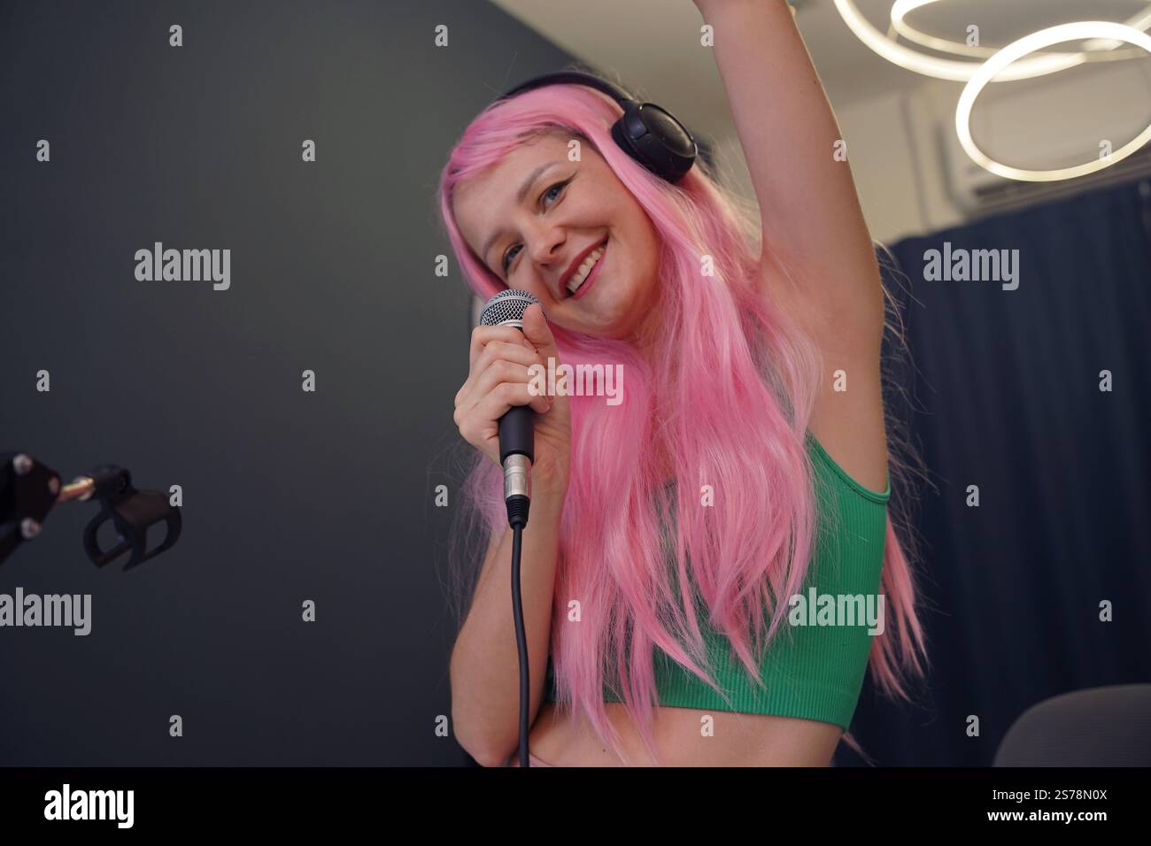 Beautiful young singer and musician broadcast from her home studio ...