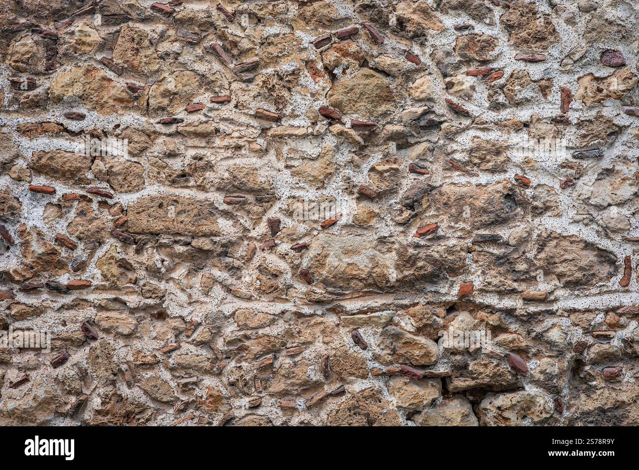 Rustic stone and brick wall texture with natural patterns Stock Photo ...