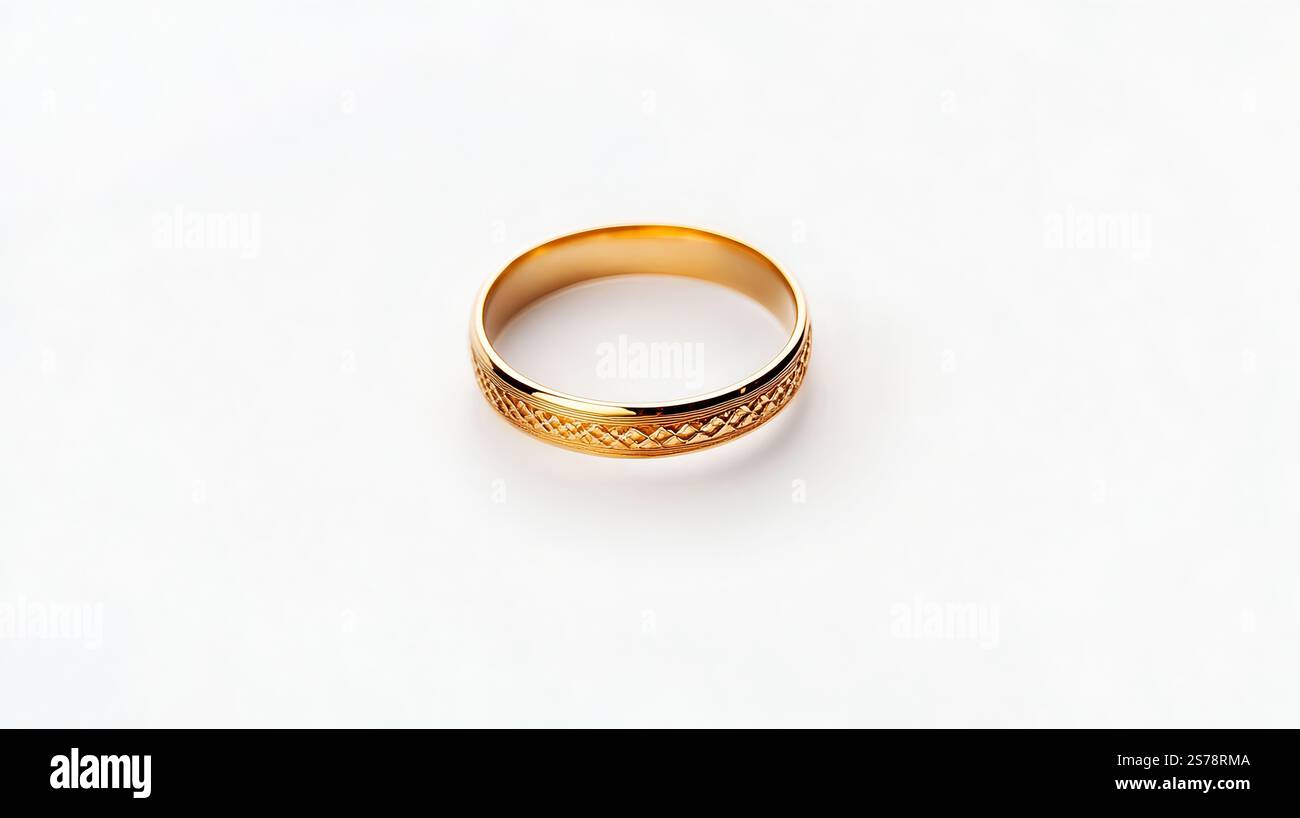Shiny,elegant gold wedding band with subtle engraved design,isolated on ...