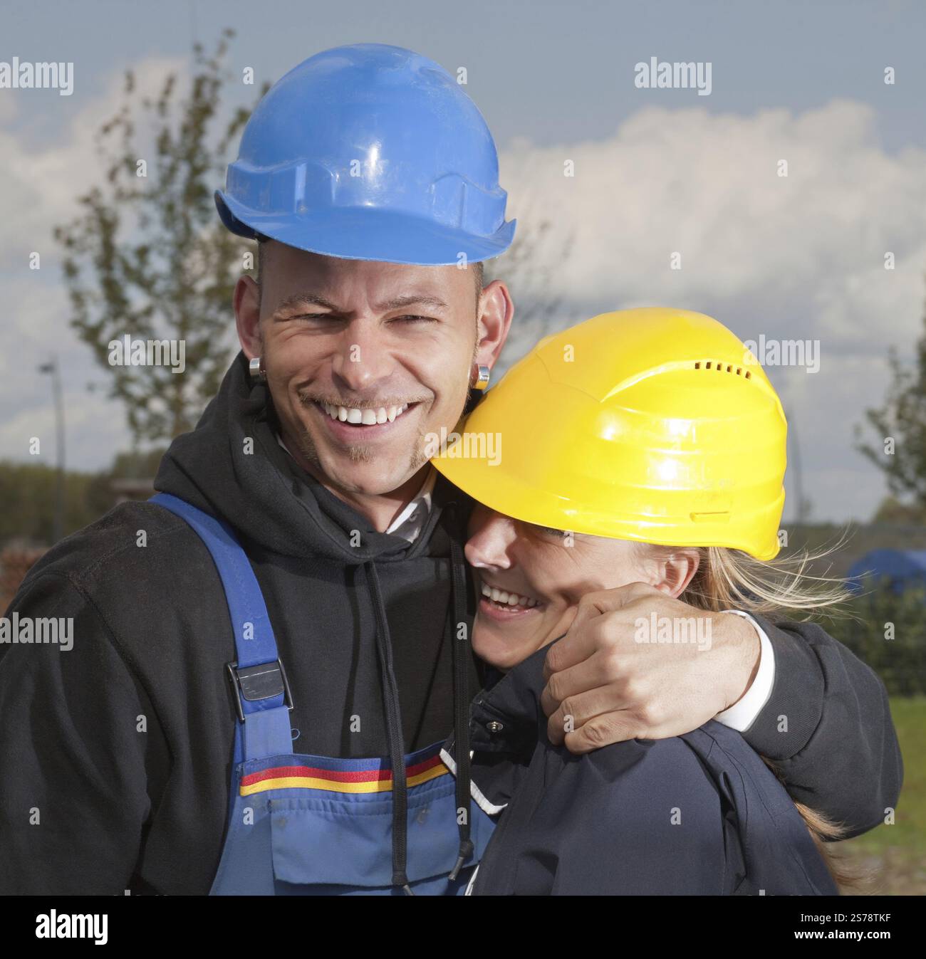 Men in hard hats hugging hi-res stock photography and images - Alamy