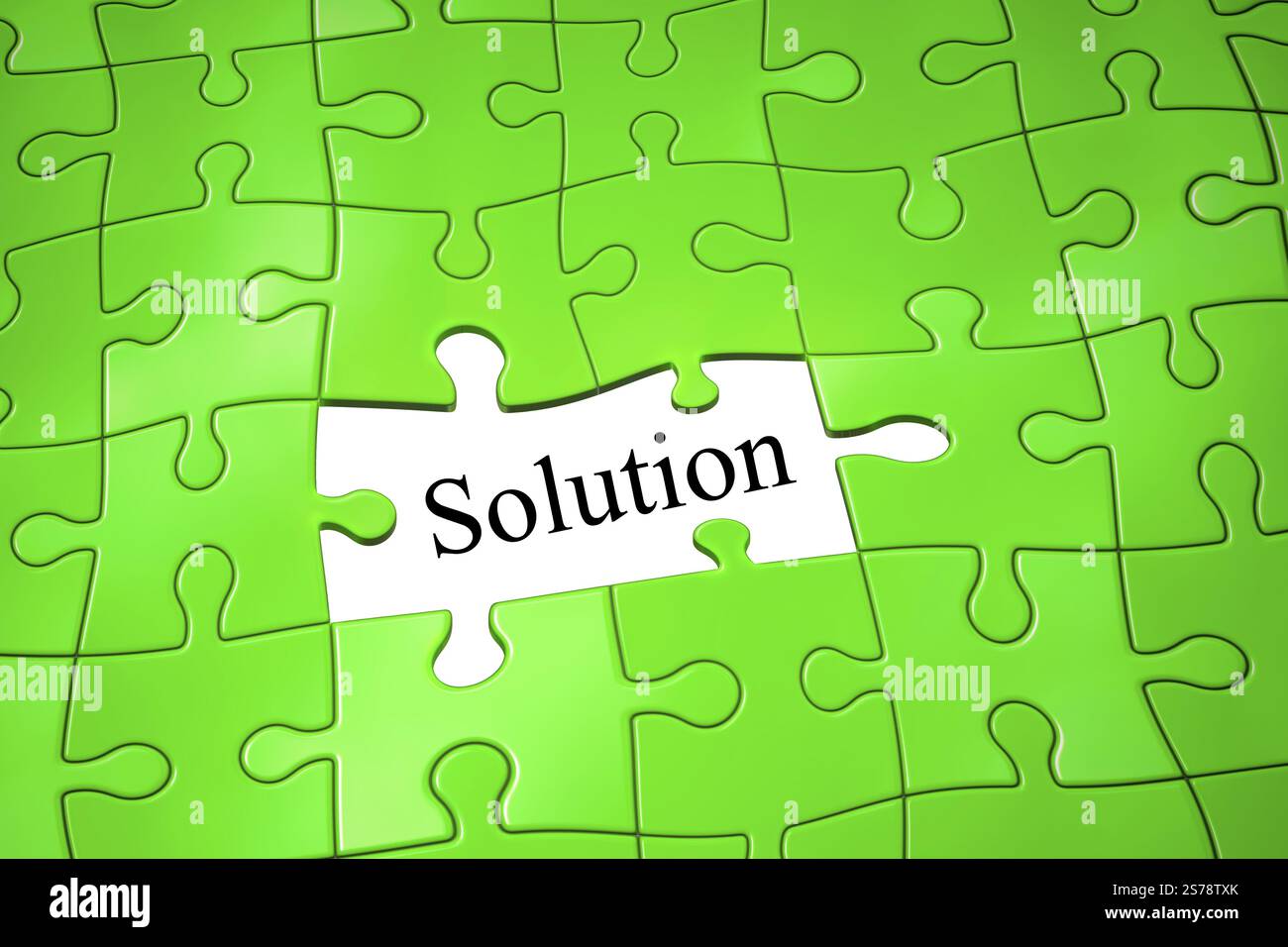 An image of a green jigsaw puzzle solution Stock Photo - Alamy