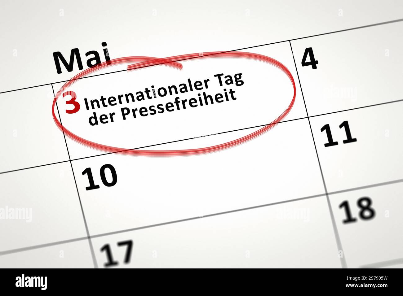 An image of a calendar detail shows may the 3rd World Press Freedom Day ...