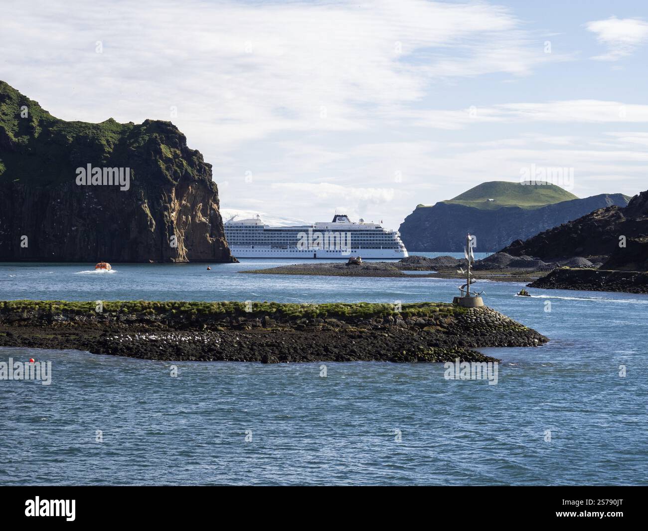 Cruise ship leaving the harbour town of Heimaey, steep cliffs, Westman ...