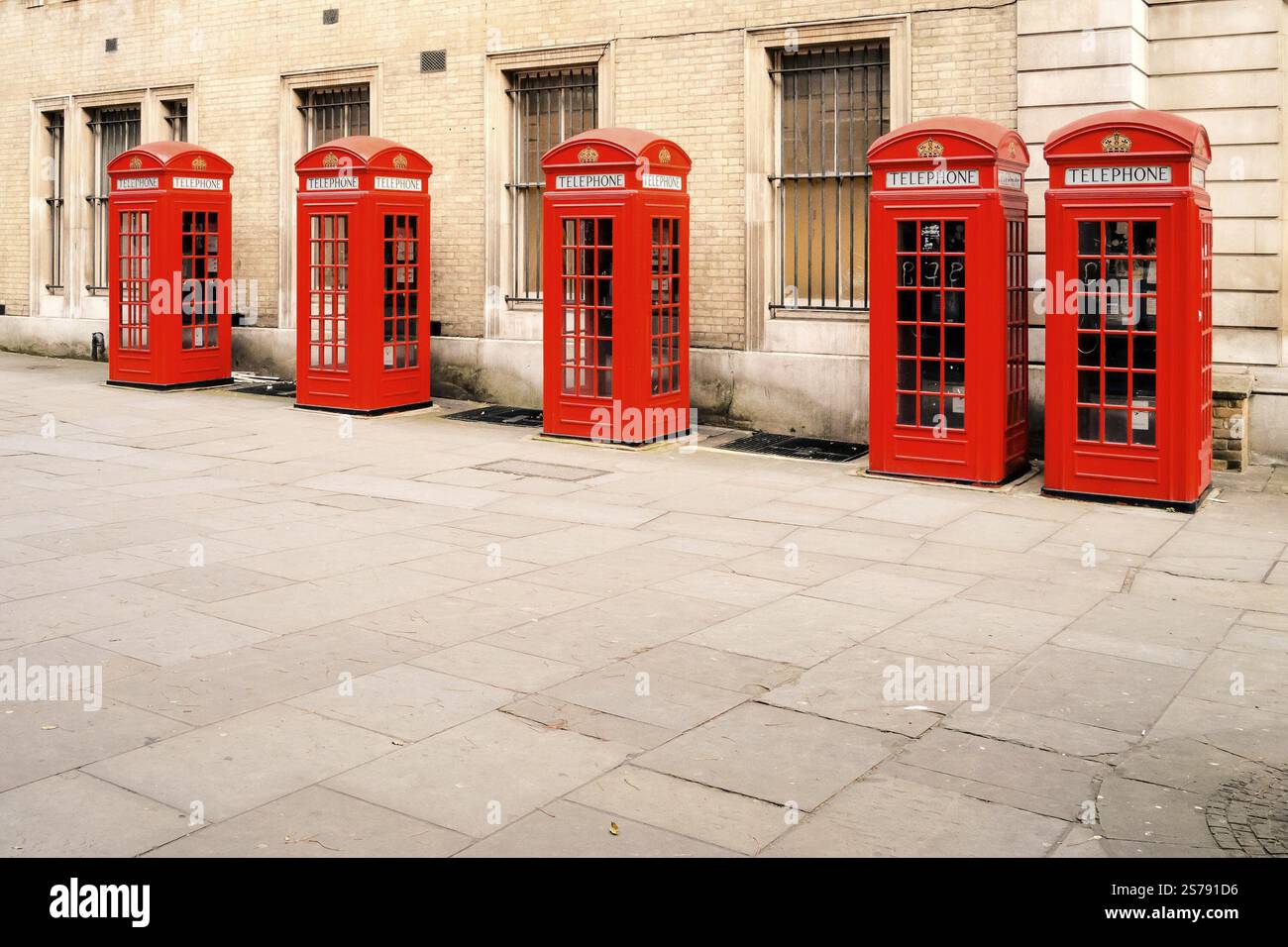 The five red phone boxes in London Stock Photo - Alamy
