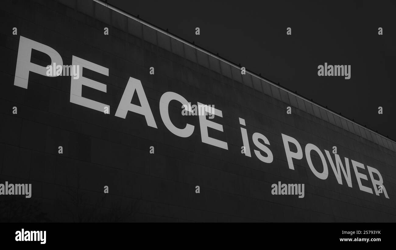 Peace is Power lettering on a building, black and white, Duesseldorf ...