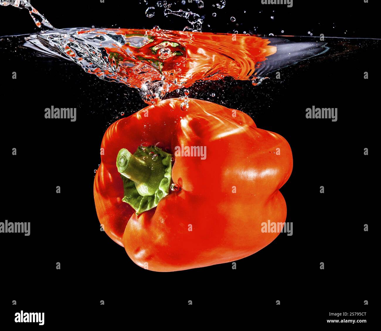 An image of red paprika in the water Stock Photo - Alamy