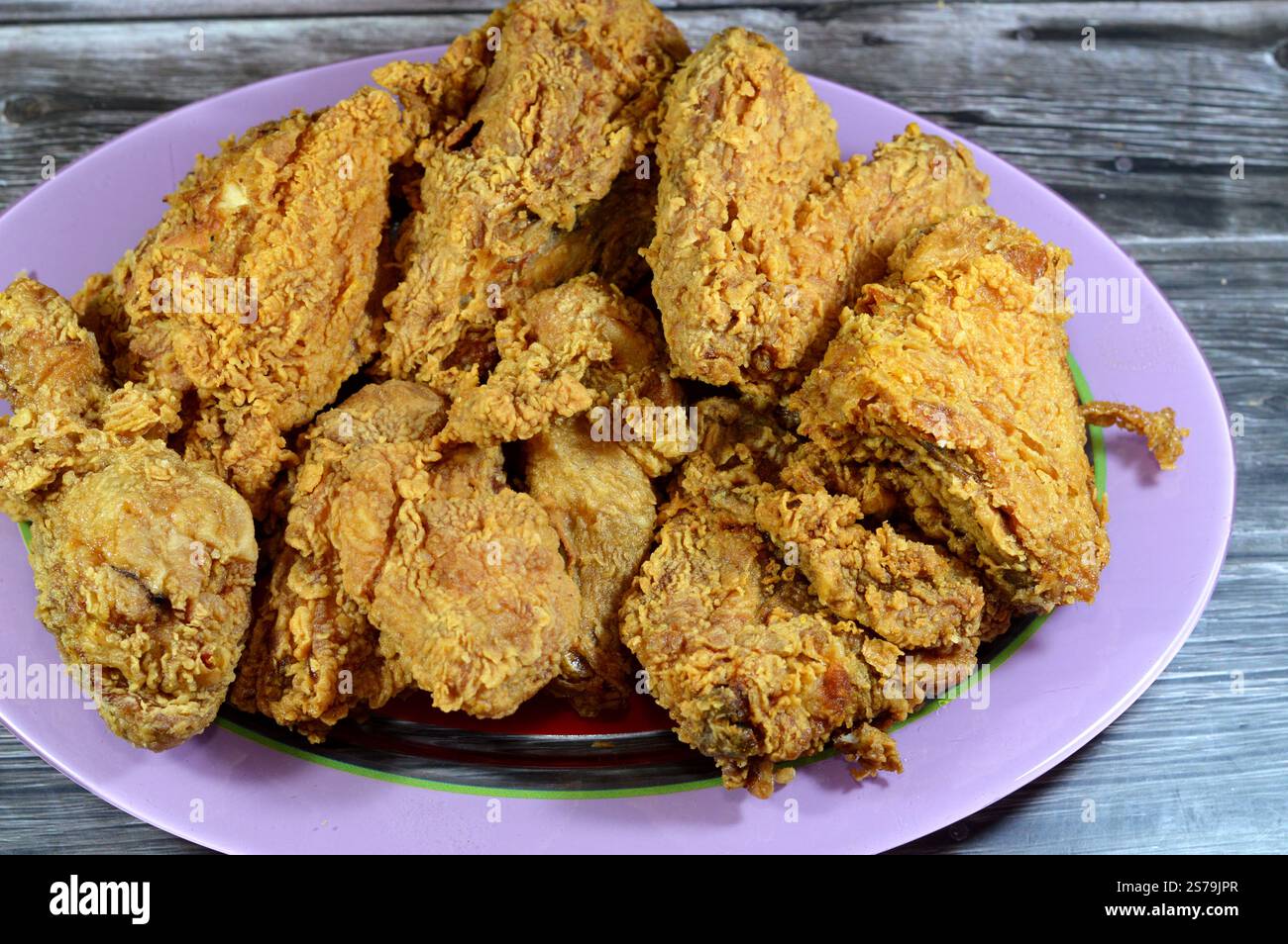 Pieces of broasted chicken meal, a broast chicken pieces, Broasting is ...
