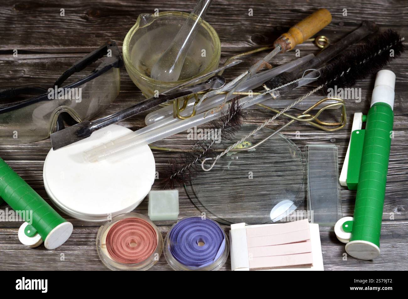 laboratory set of different equipment, safety goggles, Litmus papers to ...