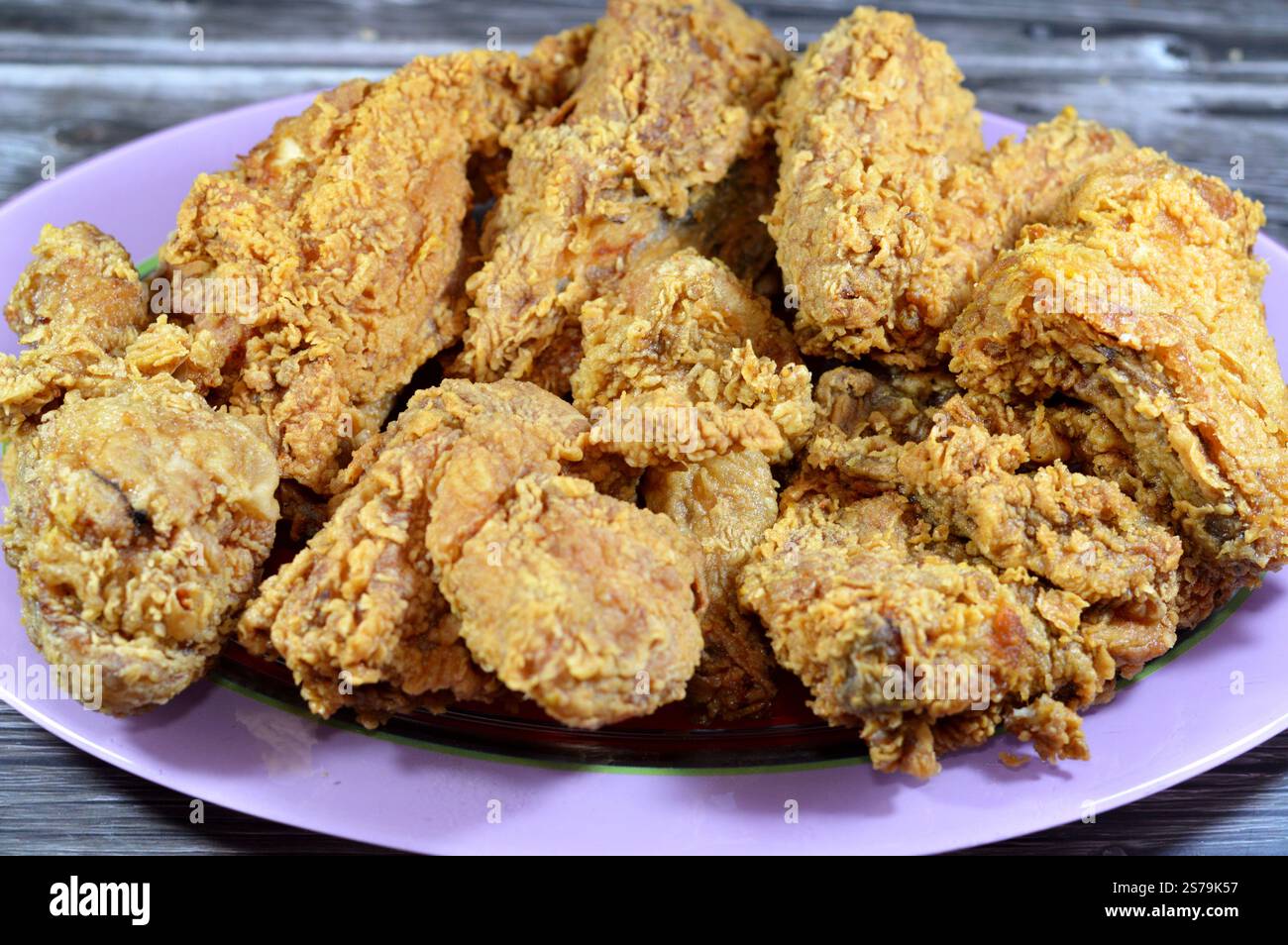 Pieces of broasted chicken meal, a broast chicken pieces, Broasting is ...