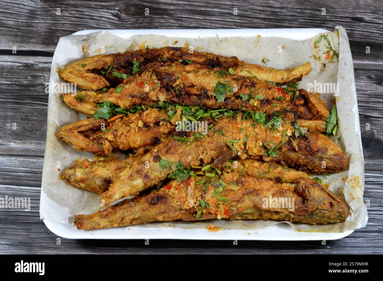 Fried Saurida undosquamis, the brushtooth lizardfish, large-scale ...