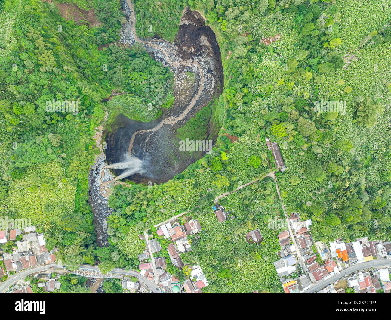 Aerial top view Coban Sriti Waterfall twin Waterfall stream that flows ...