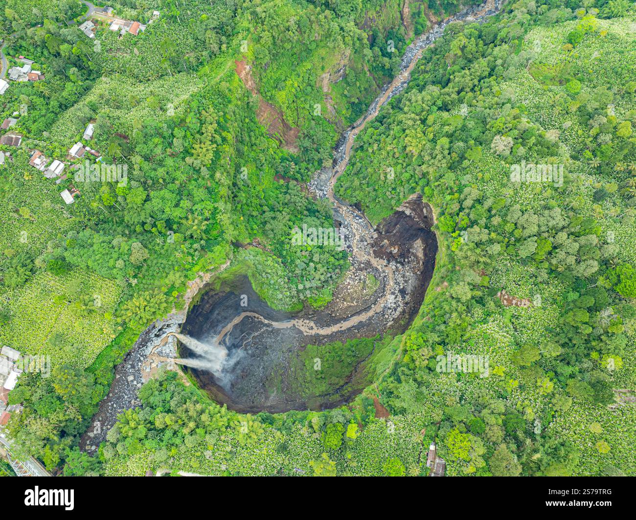 Aerial top view Coban Sriti Waterfall twin Waterfall stream that flows ...