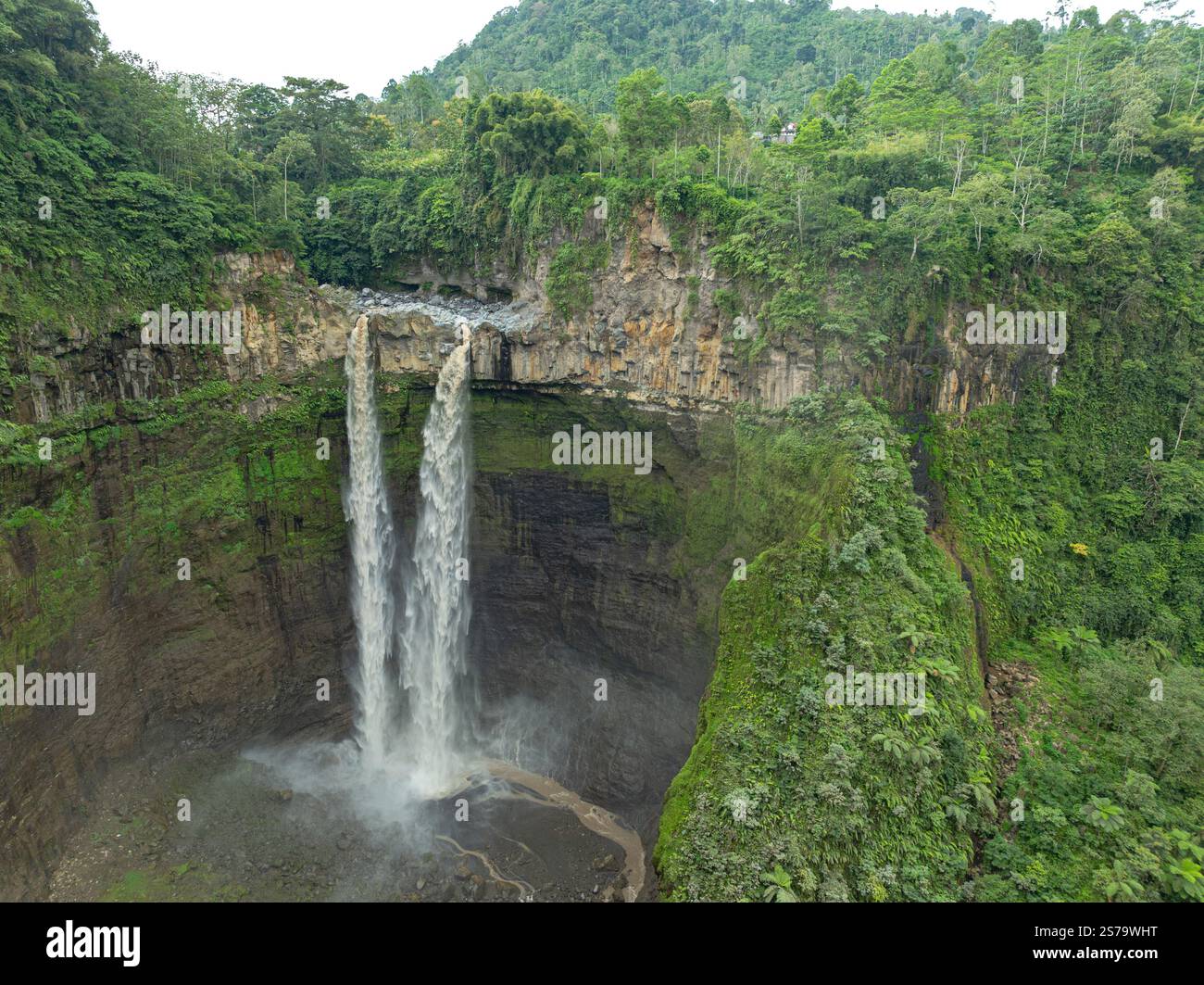 Aerial top view Coban Sriti Waterfall twin Waterfall stream that flows ...