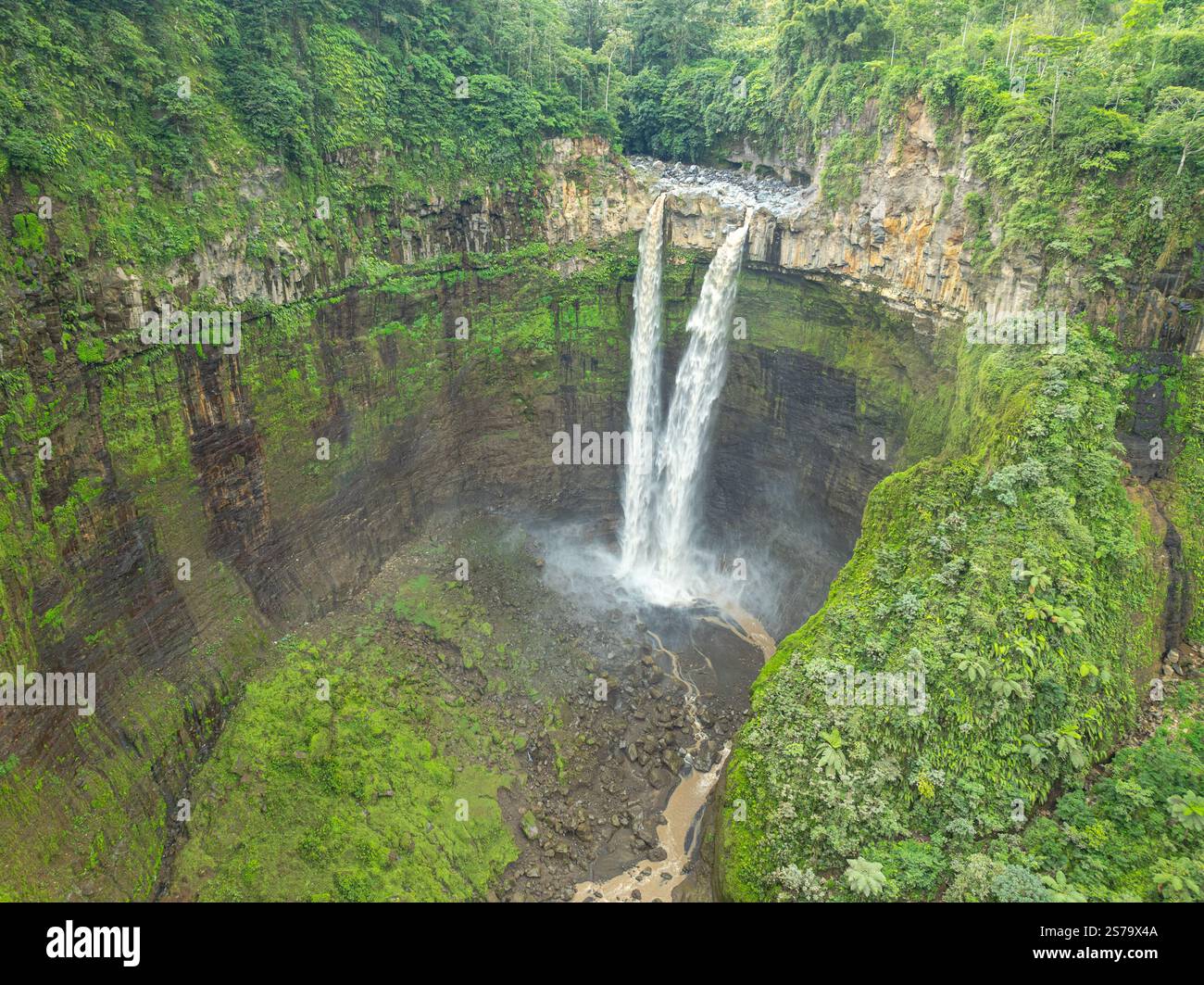 Aerial top view Coban Sriti Waterfall twin Waterfall stream that flows ...