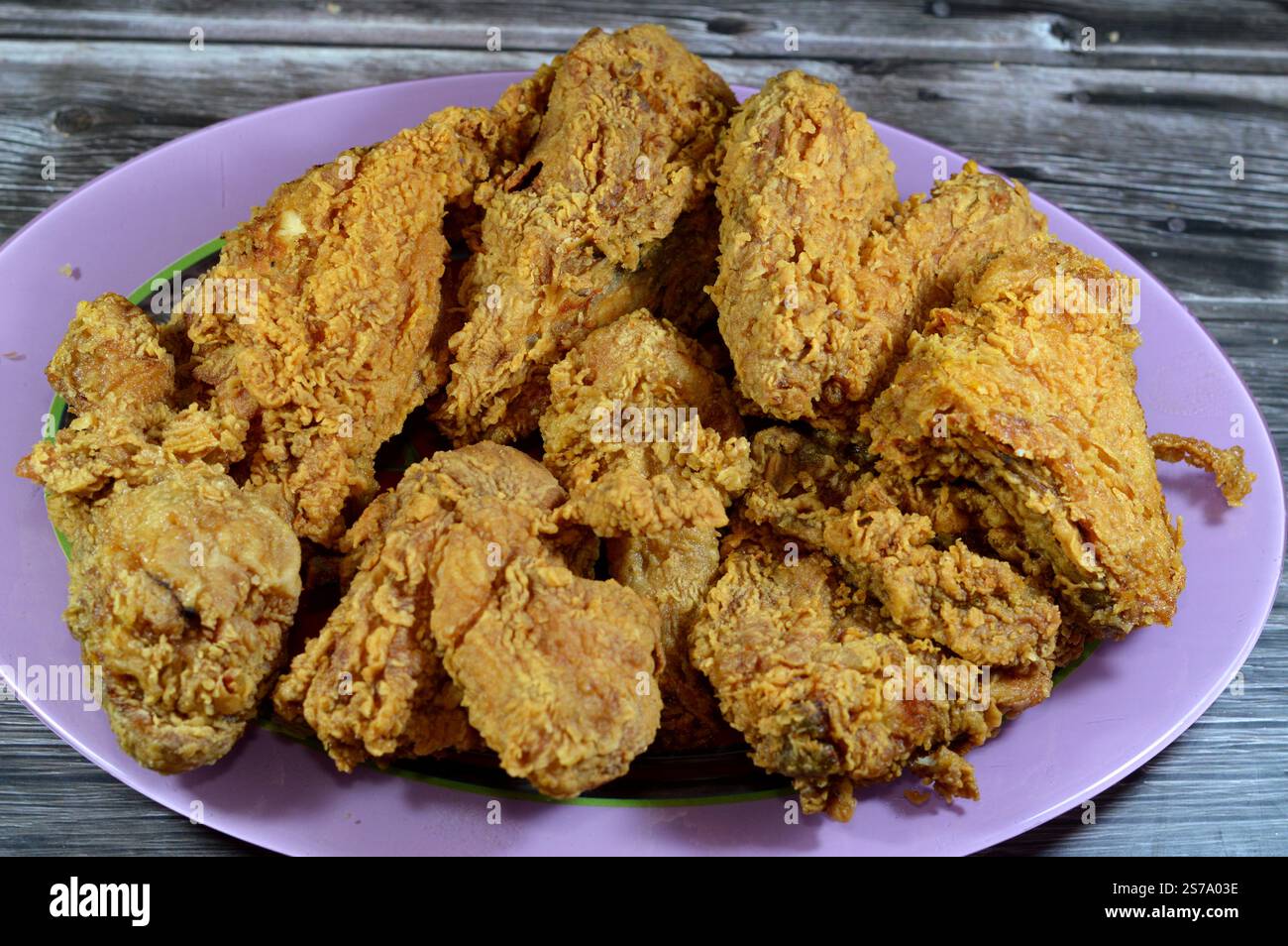 Pieces of broasted chicken meal, a broast chicken pieces, Broasting is ...