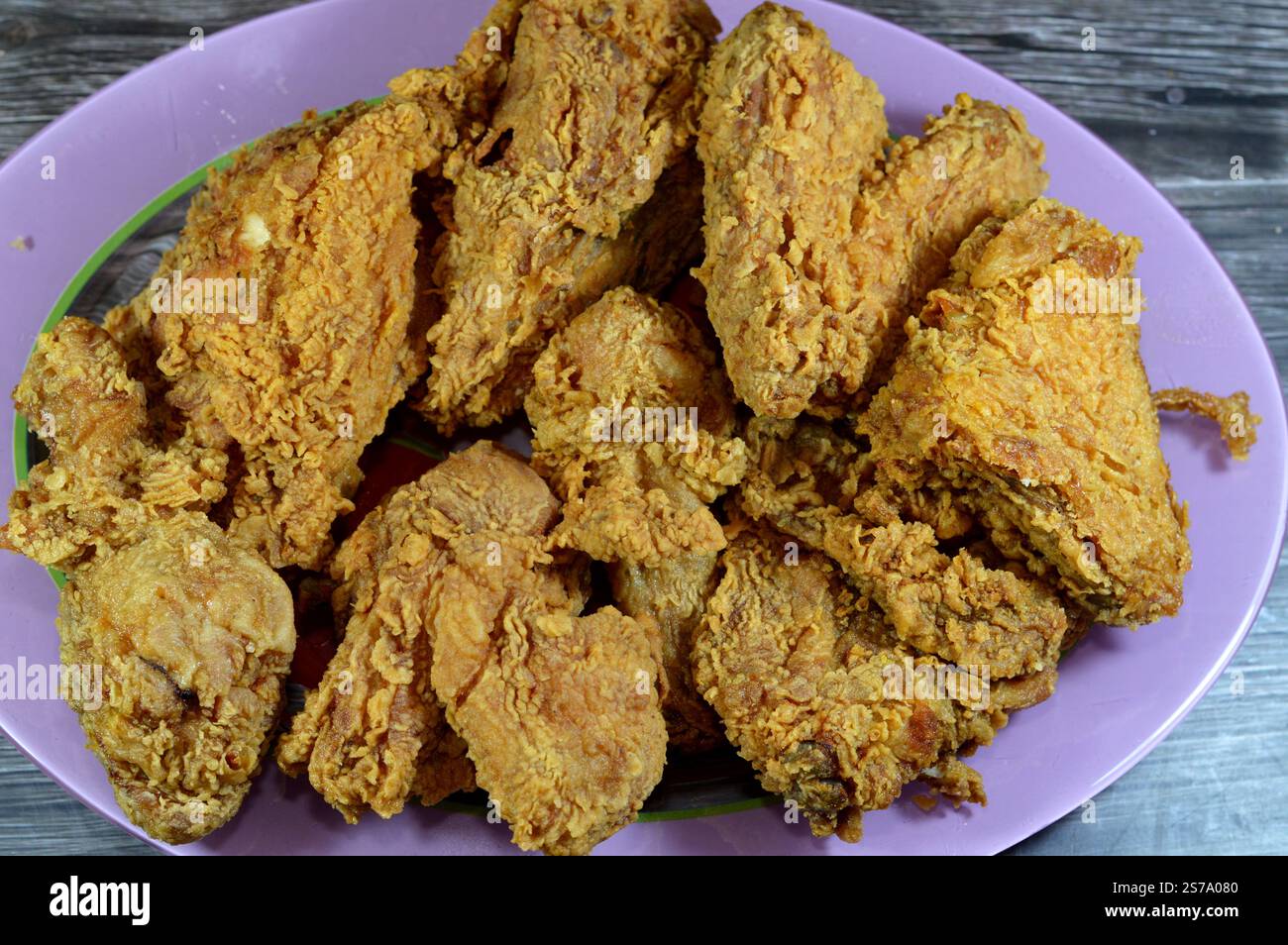 Pieces of broasted chicken meal, a broast chicken pieces, Broasting is ...