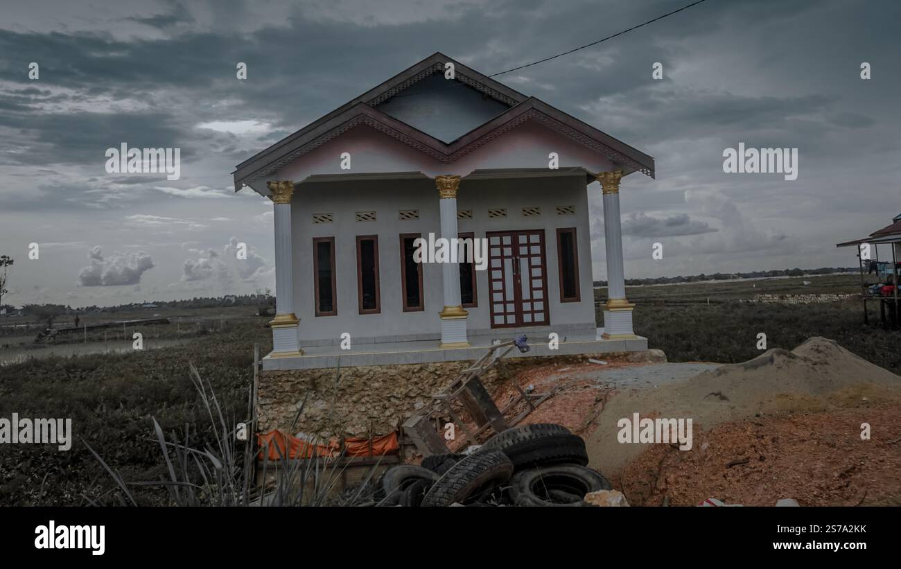 A modern house with a unique architectural design, situated in a rural ...