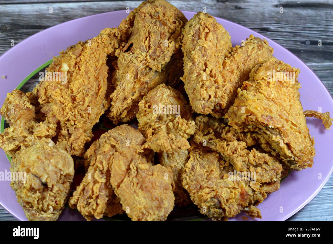 Pieces of broasted chicken meal, a broast chicken pieces, Broasting is ...