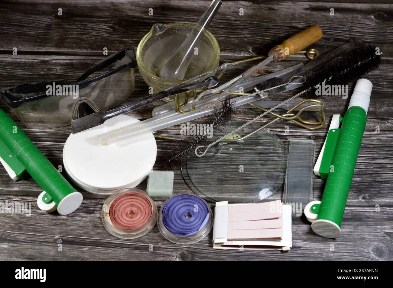 laboratory set of different equipment, safety goggles, Litmus papers to ...