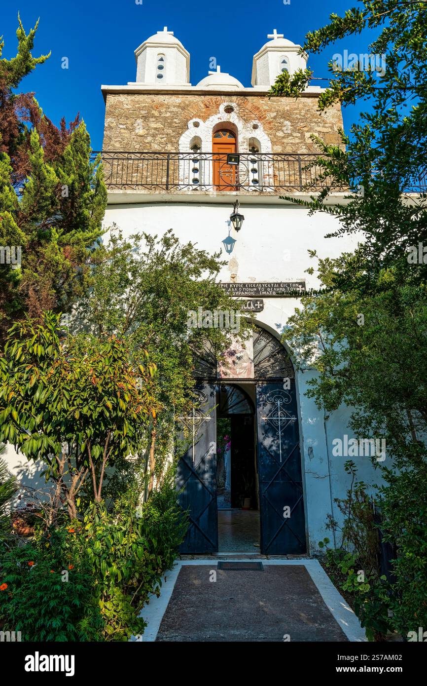 The entrance of Iera Moni Timiou Prodromou features ornate iron gates ...
