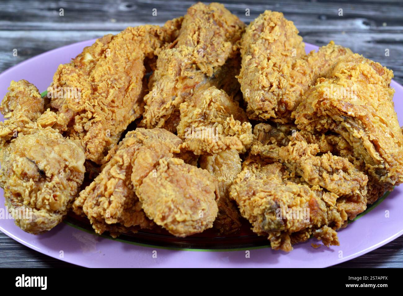 Pieces of broasted chicken meal, a broast chicken pieces, Broasting is ...