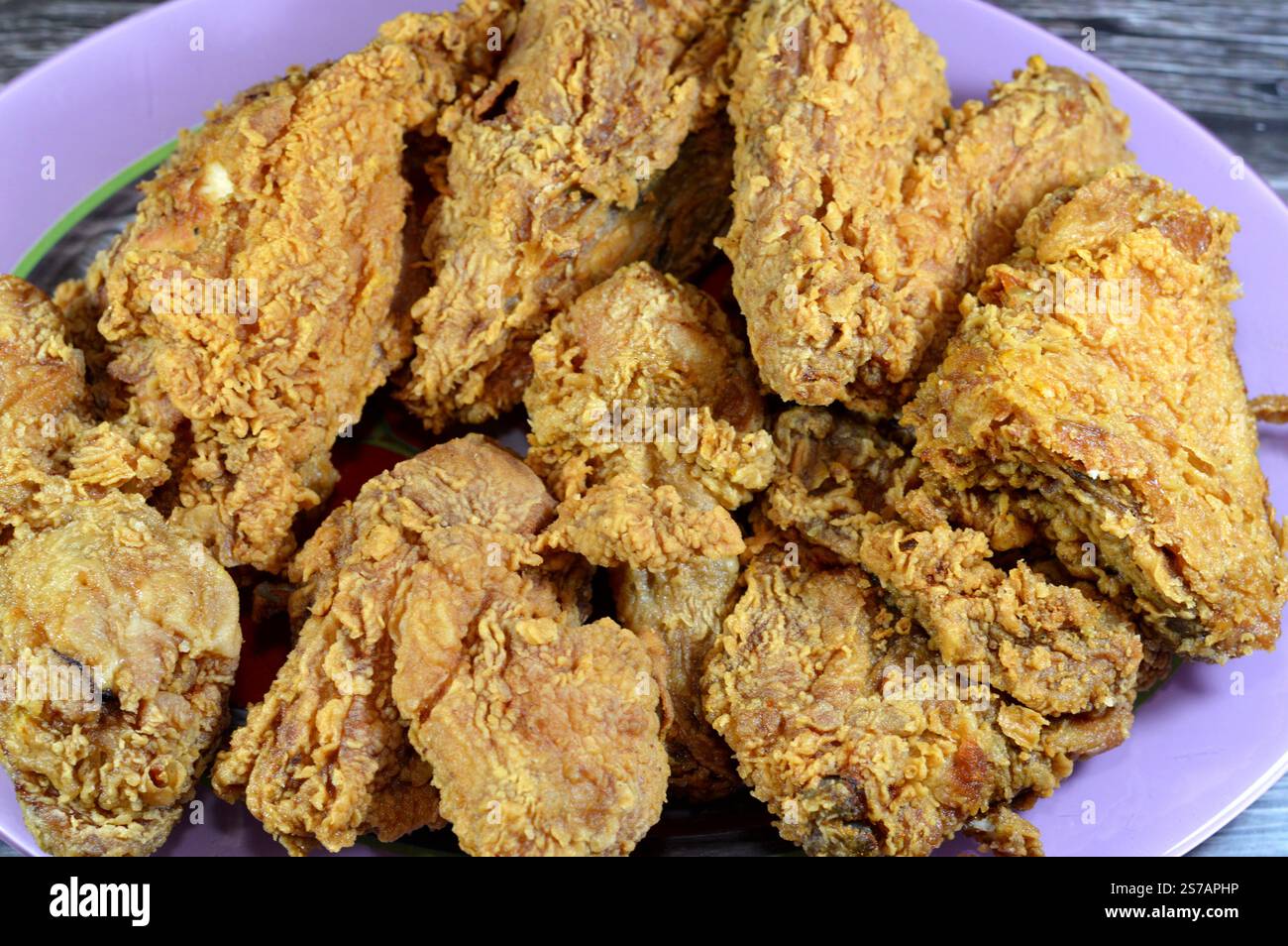 Pieces of broasted chicken meal, a broast chicken pieces, Broasting is ...