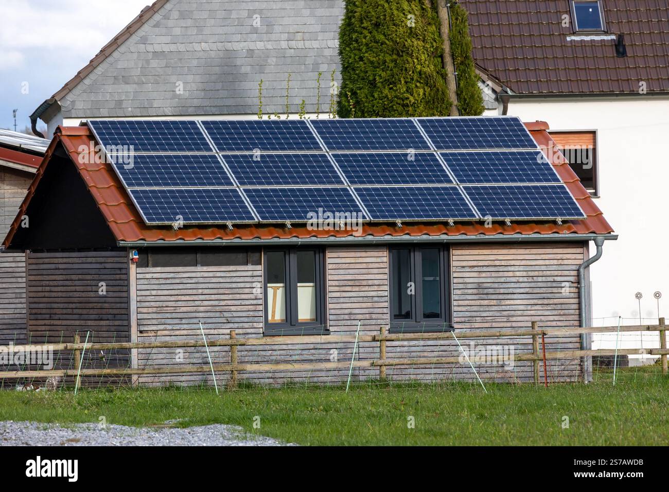 house with built-in solar cells. Alternative energy, resource saving ...