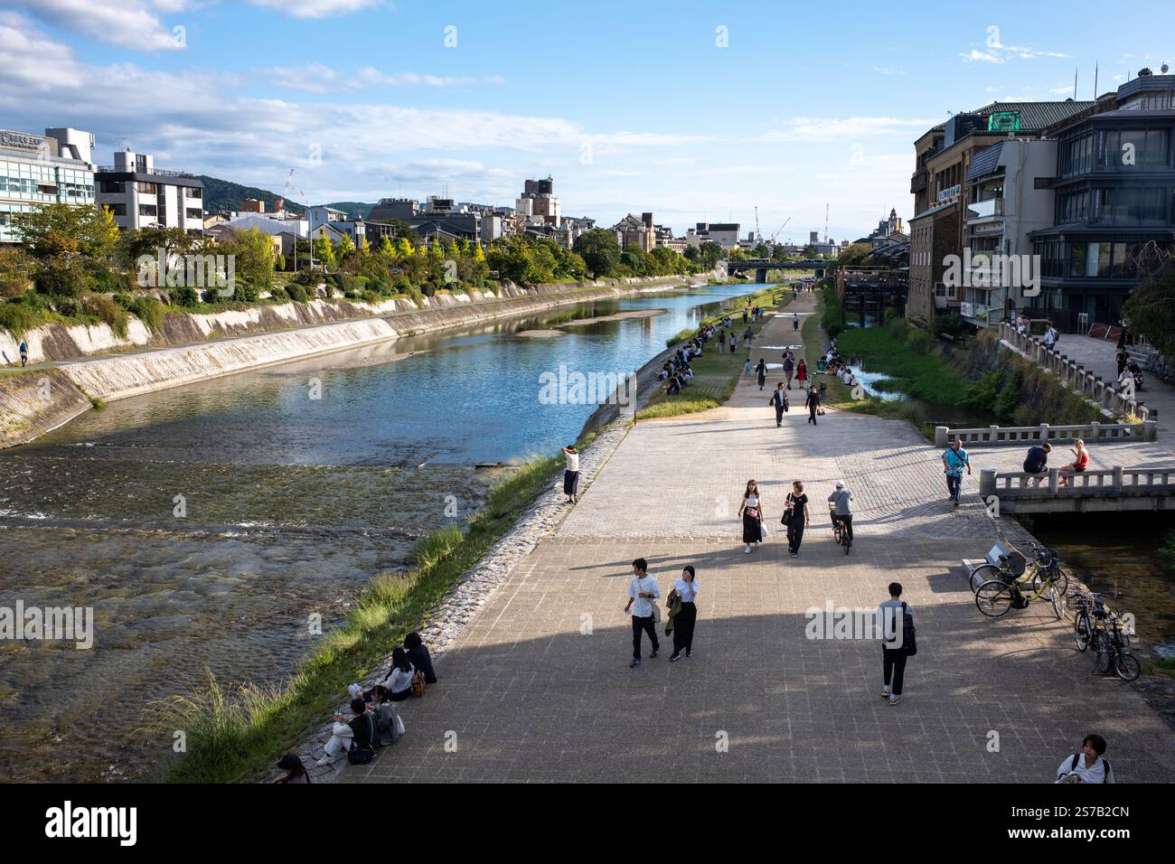 Pedestrian Walkway along the banks of the River Kamo Kyoto Japan Stock ...