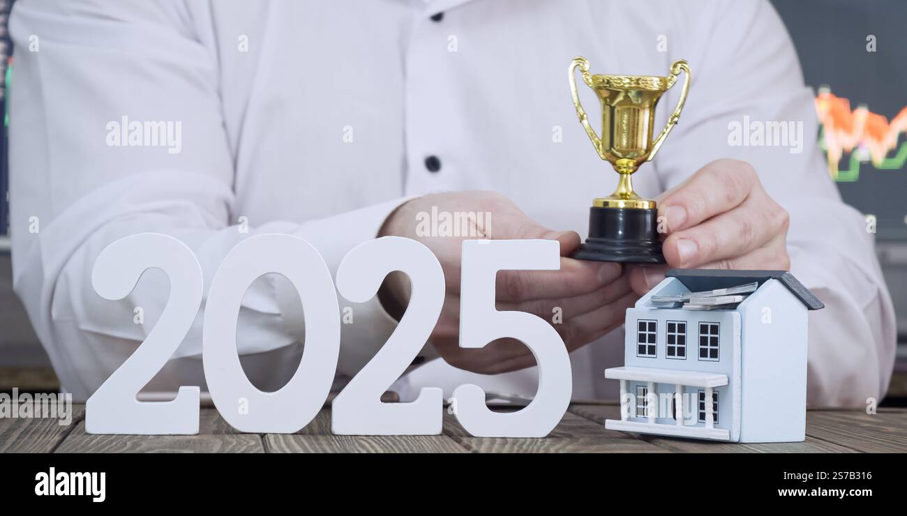 2025 business achievement and success concept: hands holding golden ...