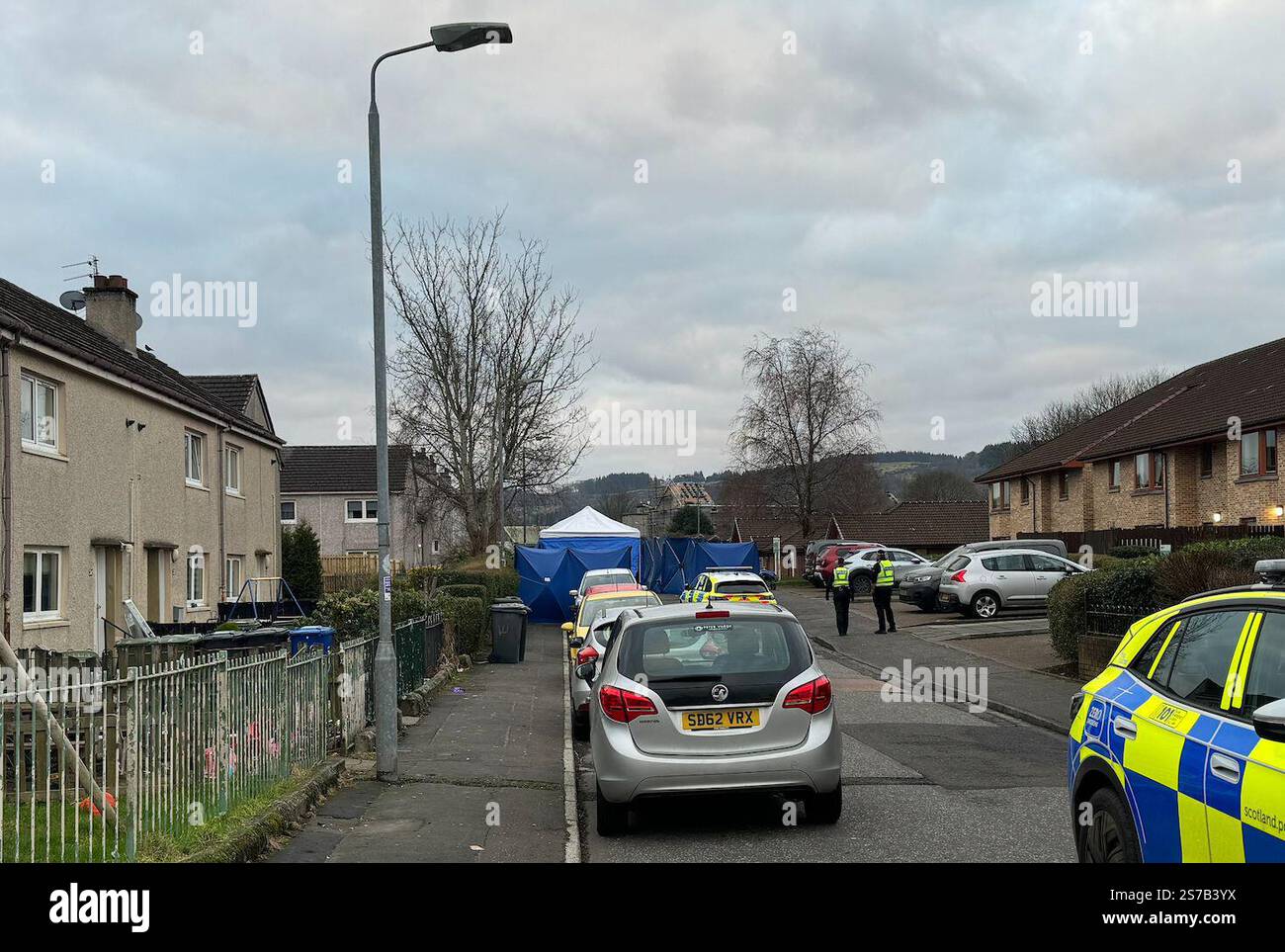 The police cordon and forensic tent on Maree Road, Paisley following an ...