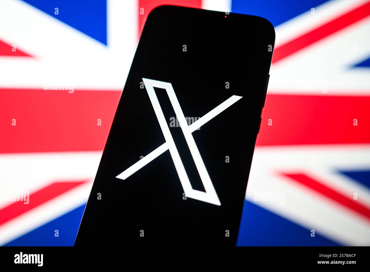 In this photo illustration a X logo is displayed on a smartphone with ...